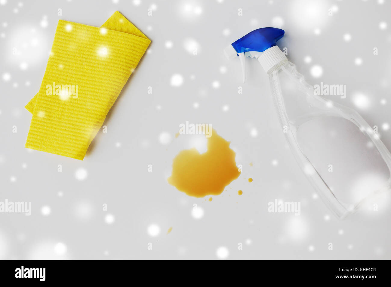 cleaning rag, detergent spray and spilled stain Stock Photo - Alamy