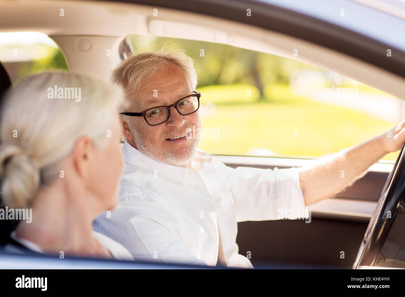 happy senior couple driving in car Stock Photo - Alamy