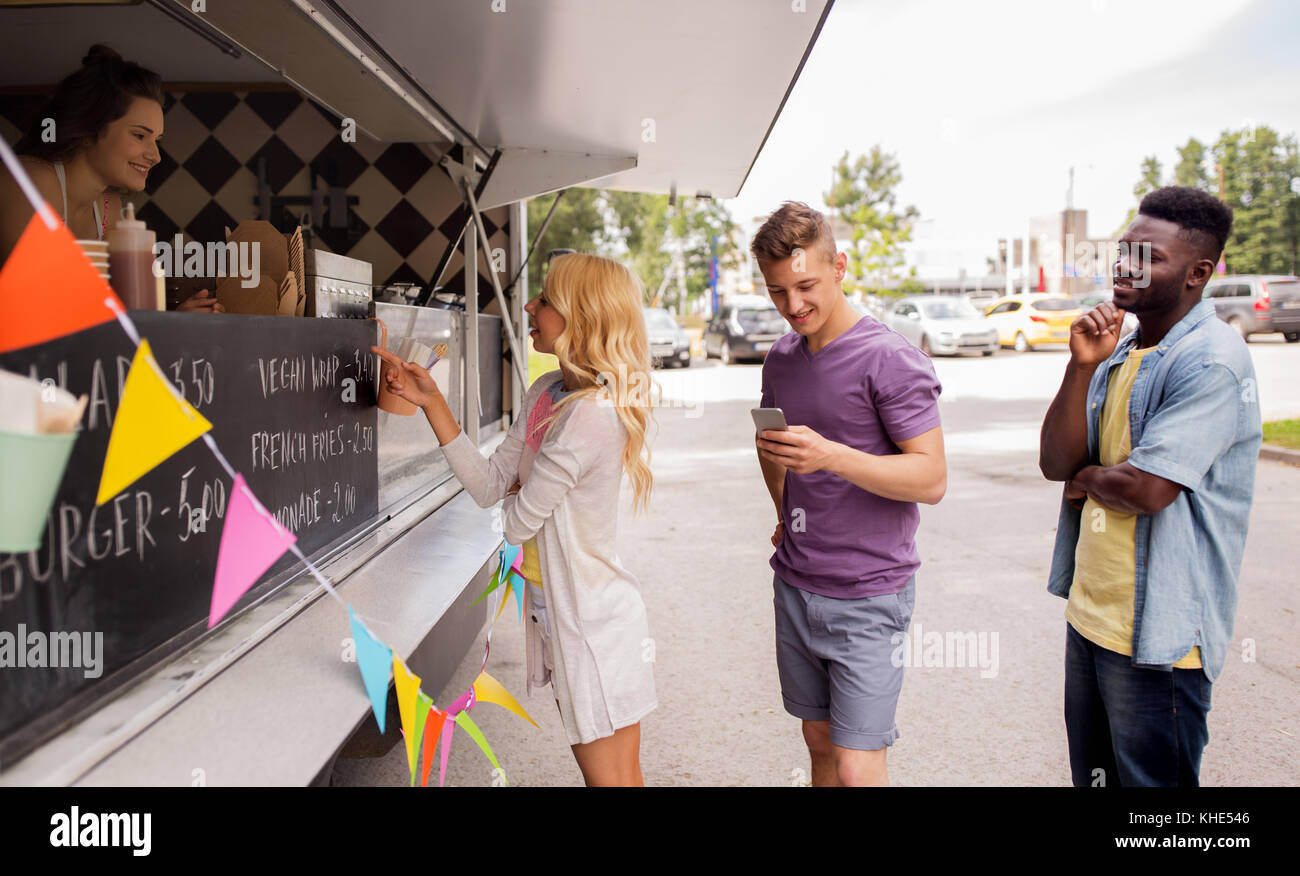 happy customers queue at food truck Stock Photo - Alamy