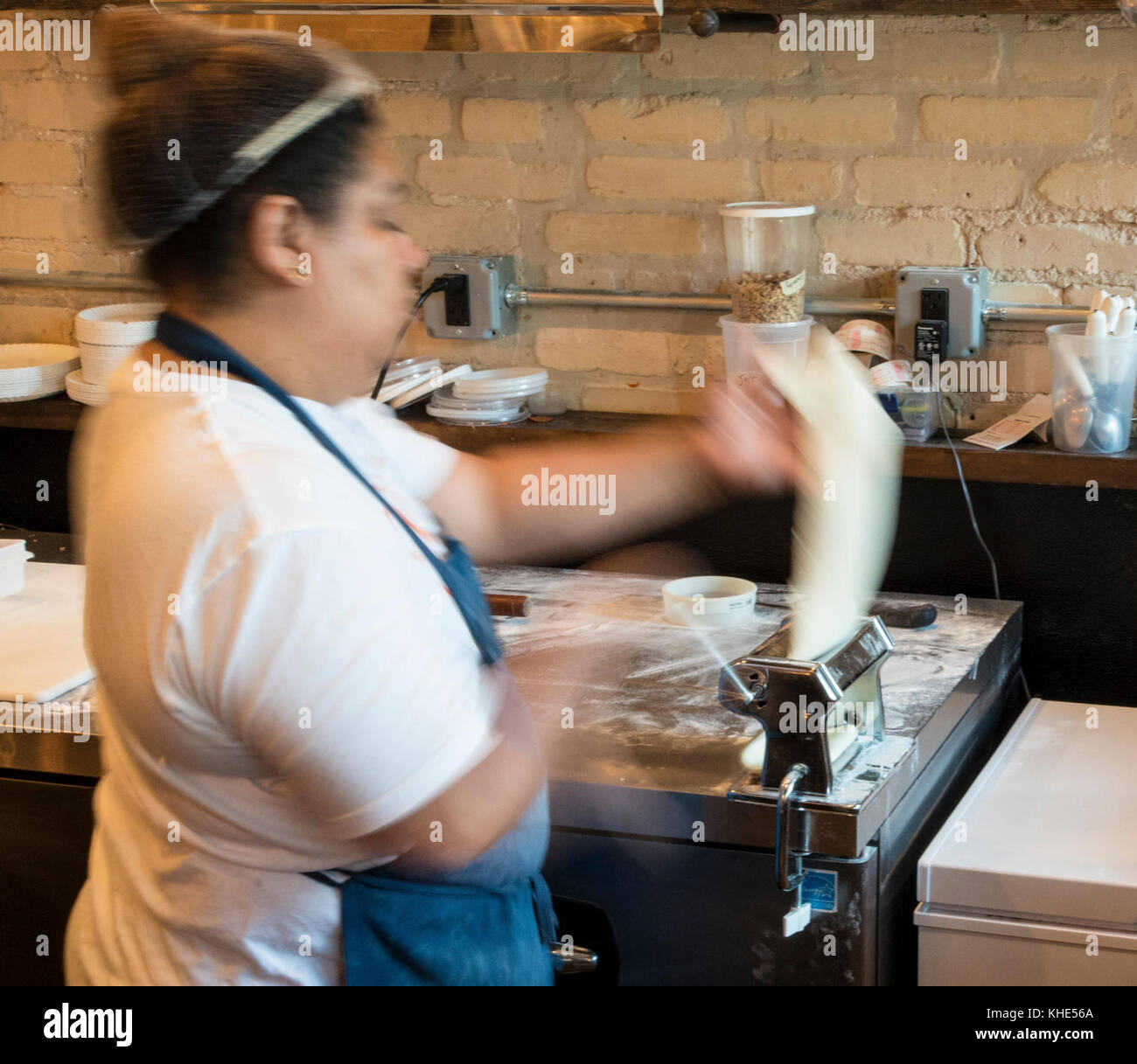 Timber Pizza Company staff prepares the dough for empanadas in ...