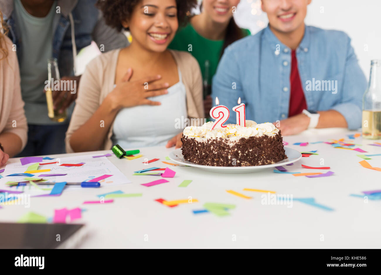 team greeting coworker at office birthday party Stock Photo - Alamy