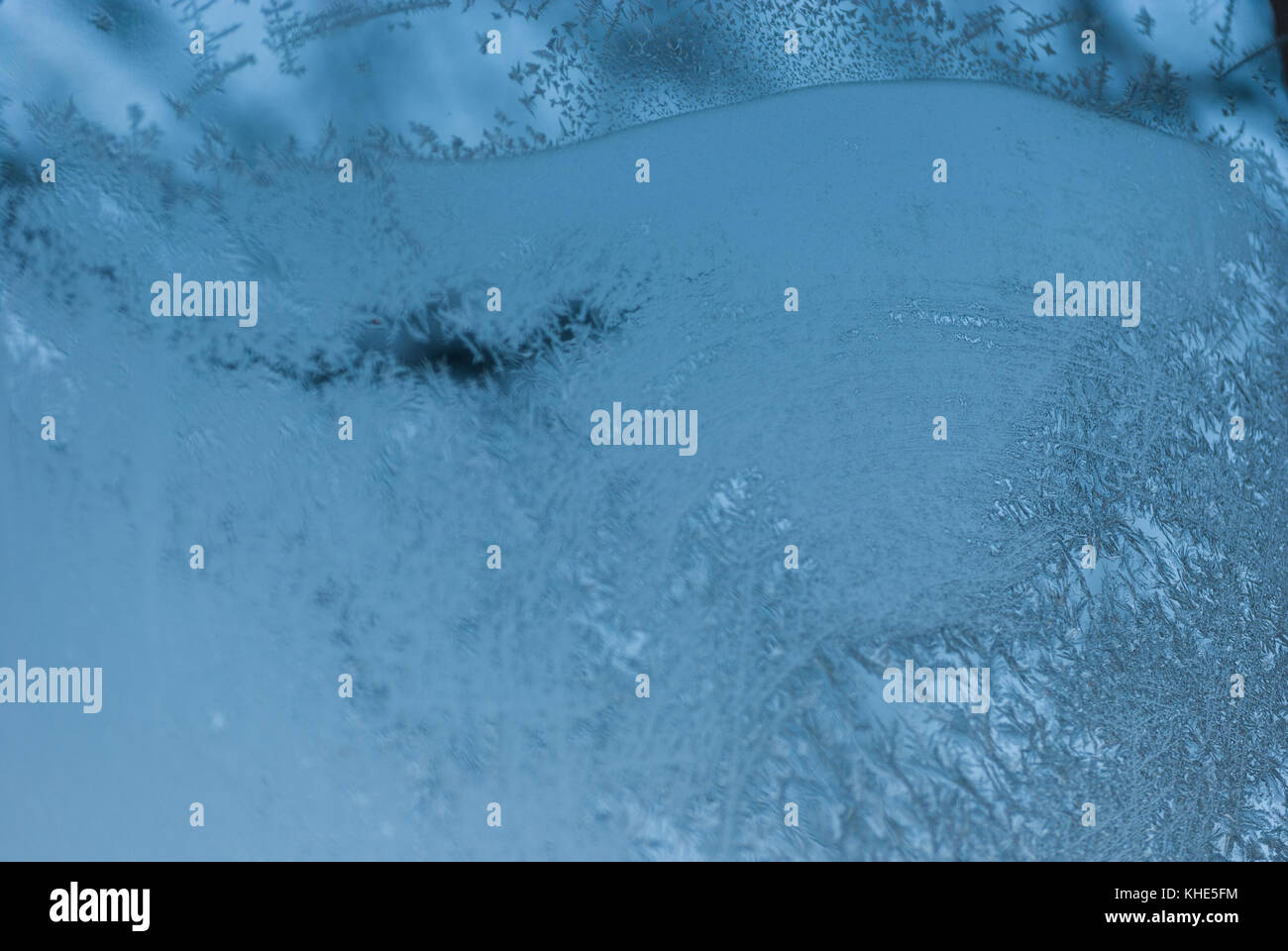 frosty patterns in the window Stock Photo - Alamy