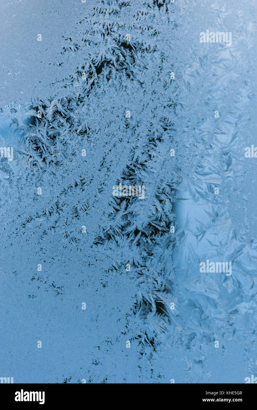 frosty patterns in the window Stock Photo - Alamy