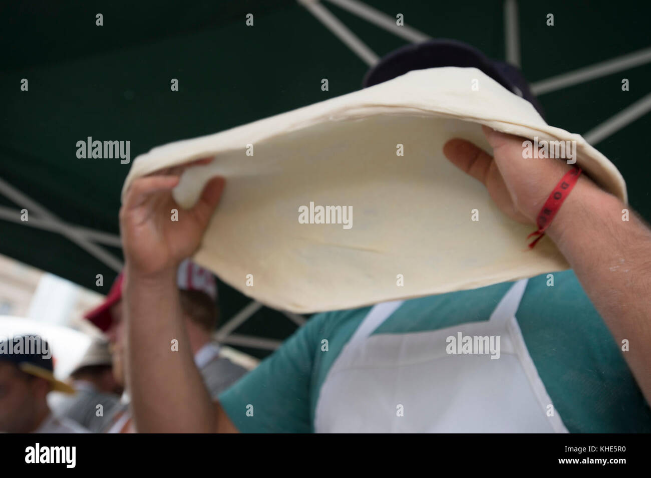 Timber Pizza Company co-owner Andrew Dana works the pizza dough at the ...