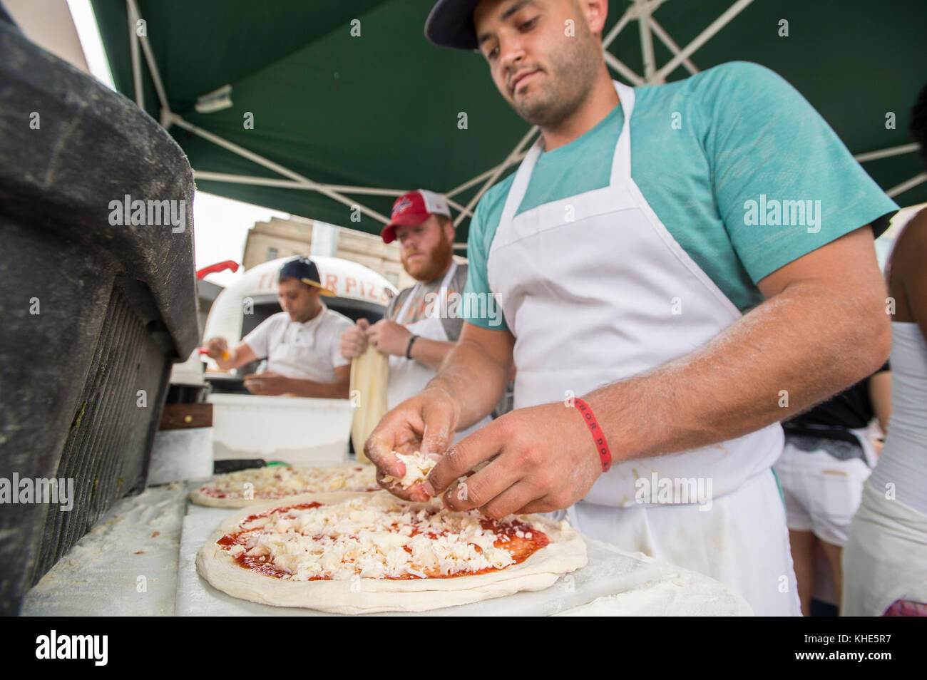 Timber Pizza Company co-owner Andrew Dana worked the pizza dough, now ...