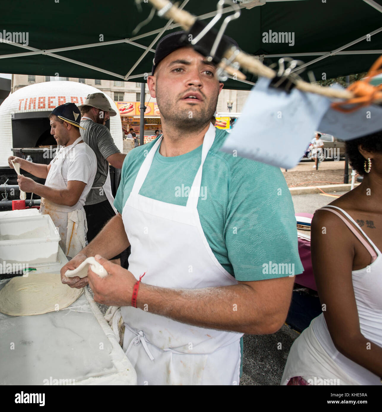 Timber Pizza Company co-owner Andrew Dana keeps an eye on upcoming ...
