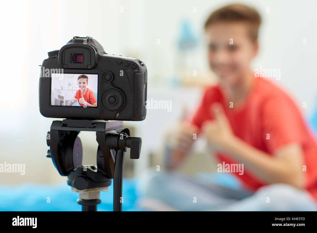 camera recording video of blogger boy at home Stock Photo - Alamy