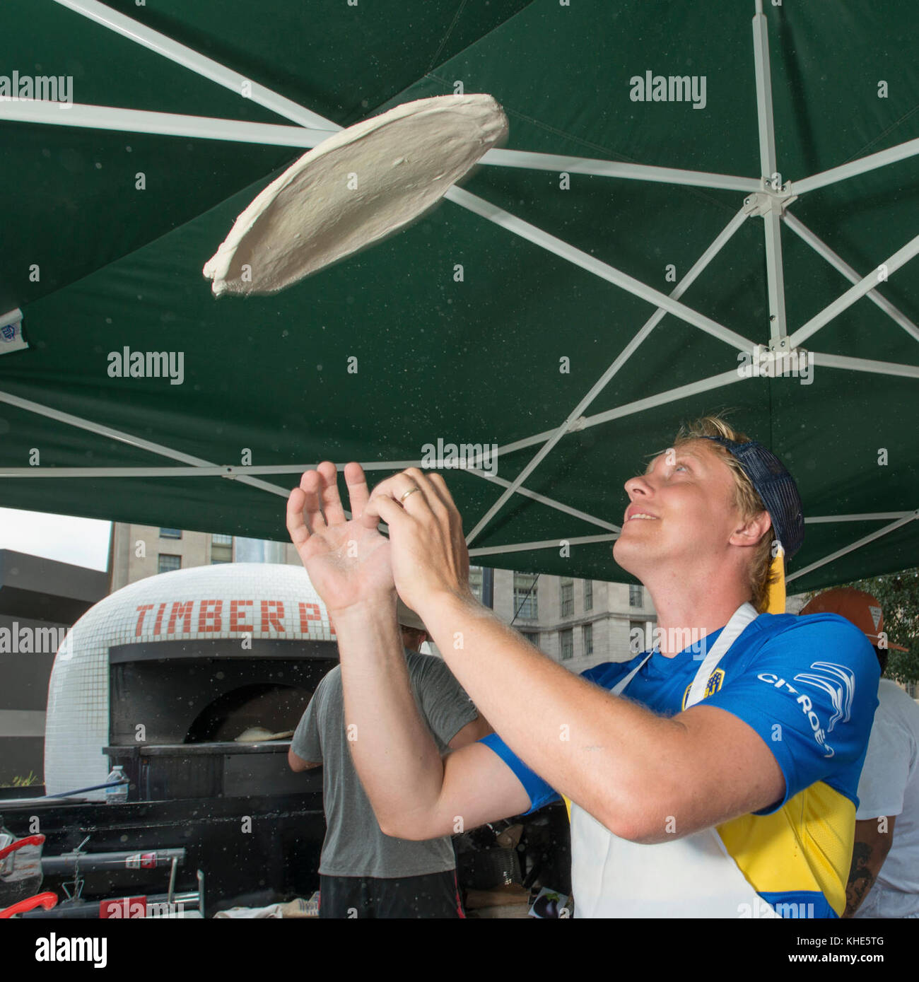 Timber Pizza Company's Jason Kellogg throws the dough high inside a U.S ...
