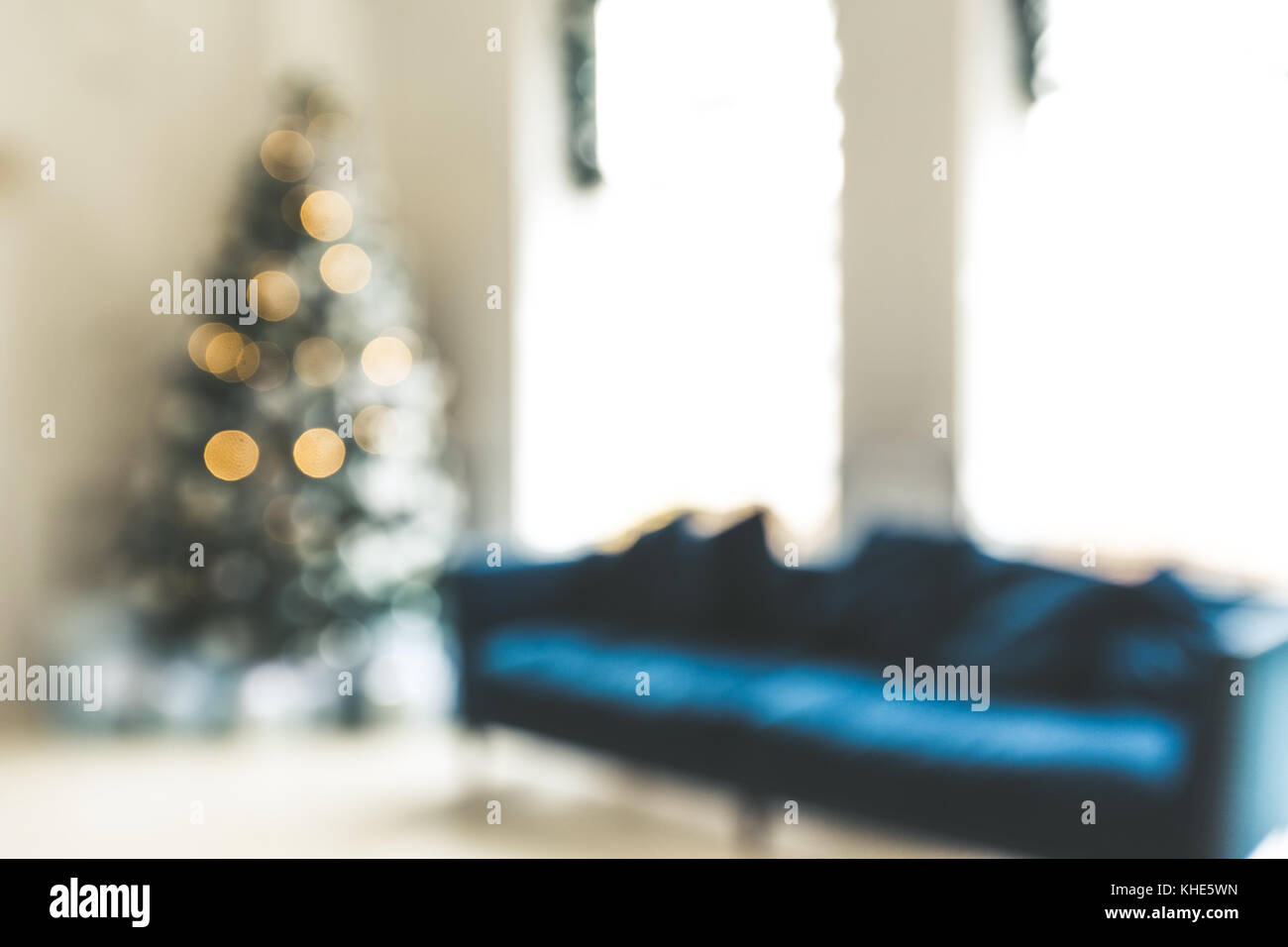 Defocused background Living room with christmas tree Stock Photo - Alamy