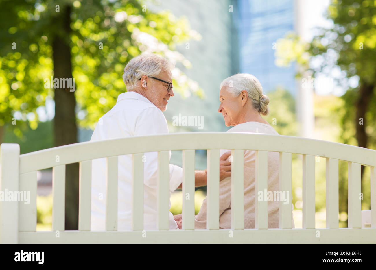 Elderly woman sitting rear view bench hi-res stock photography and ...