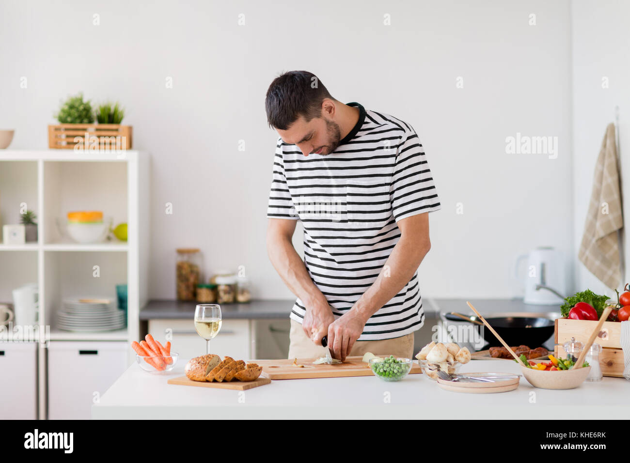 Man is cooking hi-res stock photography and images - Alamy