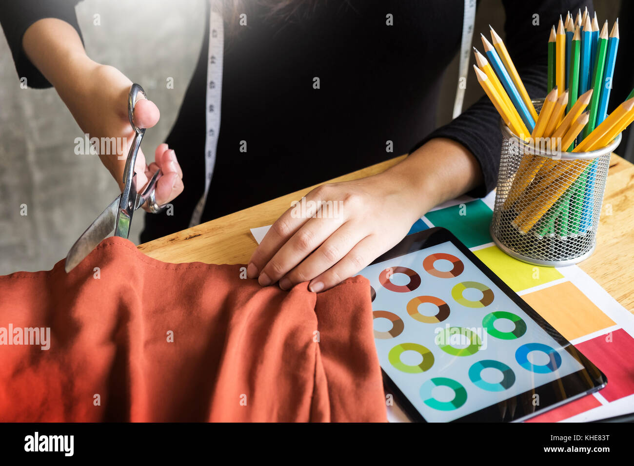 Scissors cutting piece cloth hi-res stock photography and images - Alamy
