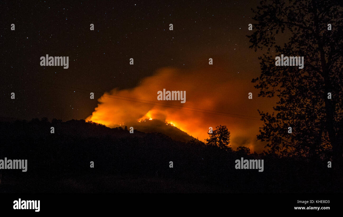Stars shine above the Cedar Fire in and near the U.S. Department of ...