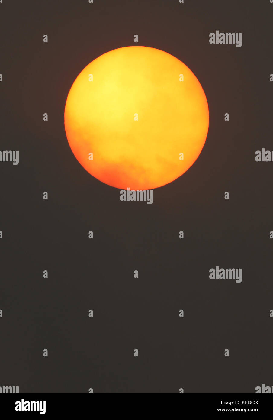 Red sun over London. The red appearance was due to the remnants of ...