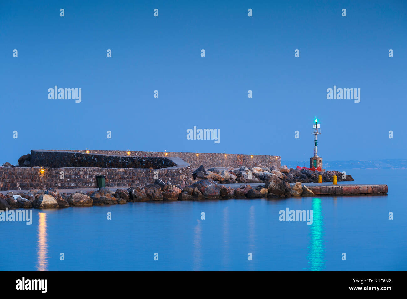 Pier and the light of the port in Chios town, Greece Stock Photo - Alamy