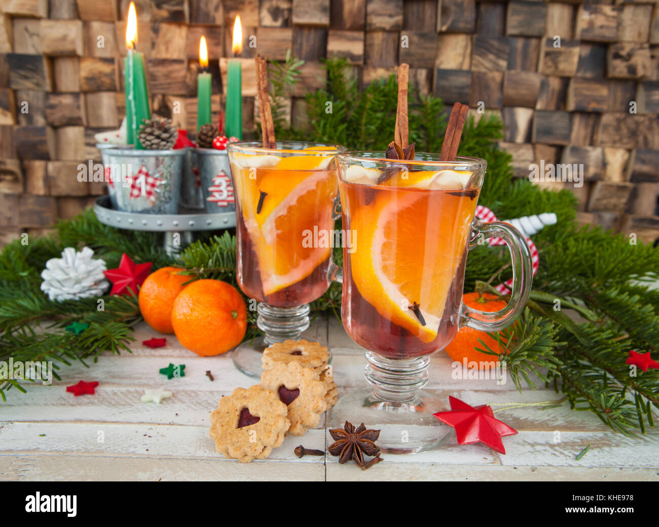 Hot spiced beverage with orange and cinnamon Stock Photo - Alamy