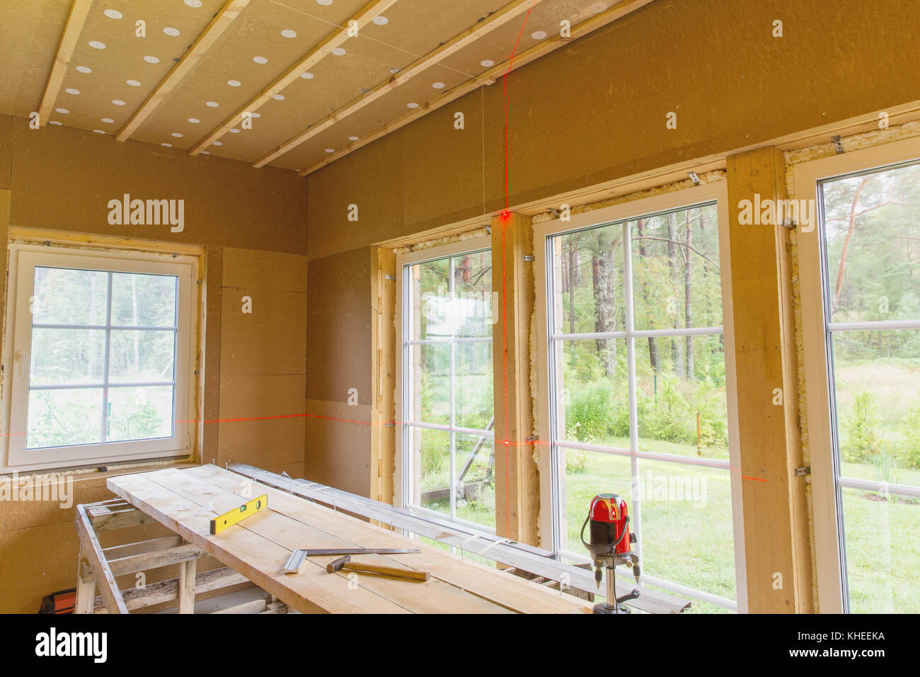 Construction work, finishing work in a wooden house and installing ...