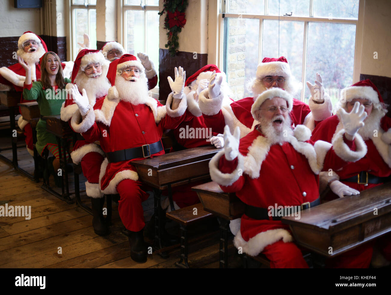 A classroom of elevs and Father Christmas performers receiving ...