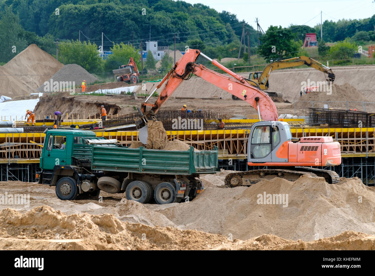 Dump truck loading sand hi-res stock photography and images - Alamy