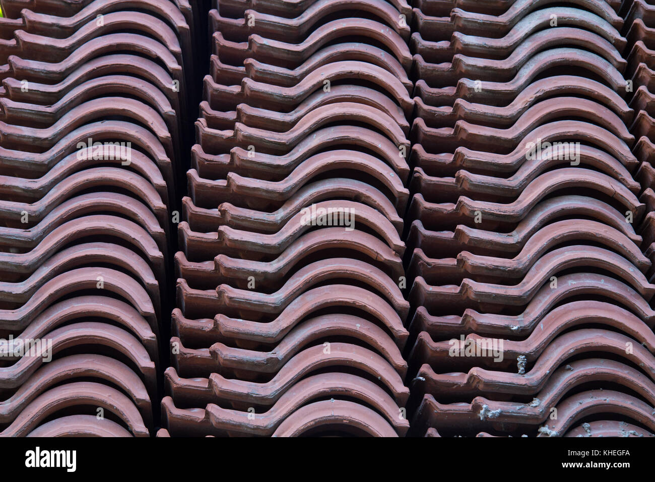 Pattern of piles of roof tiles Stock Photo - Alamy