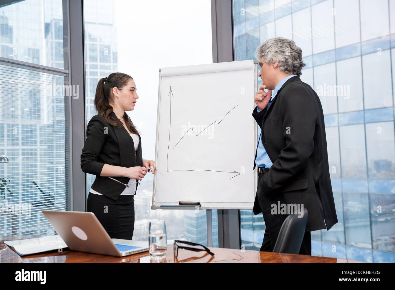 Young business woman making a presentation Stock Photo - Alamy