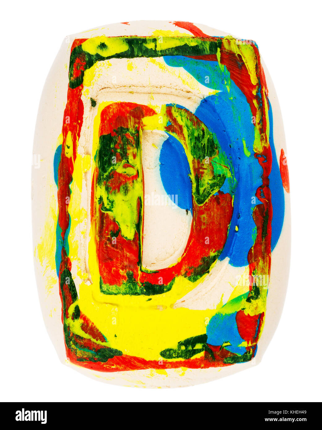Handmade of white clay letter D painted with colorful acrylic paints ...