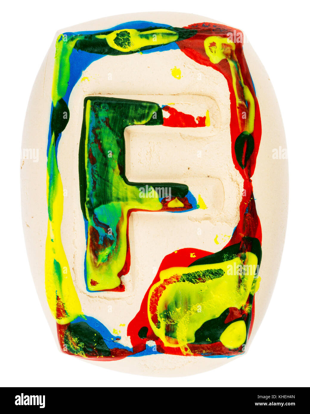 Handmade of white clay letter F painted with colorful acrylic paints ...