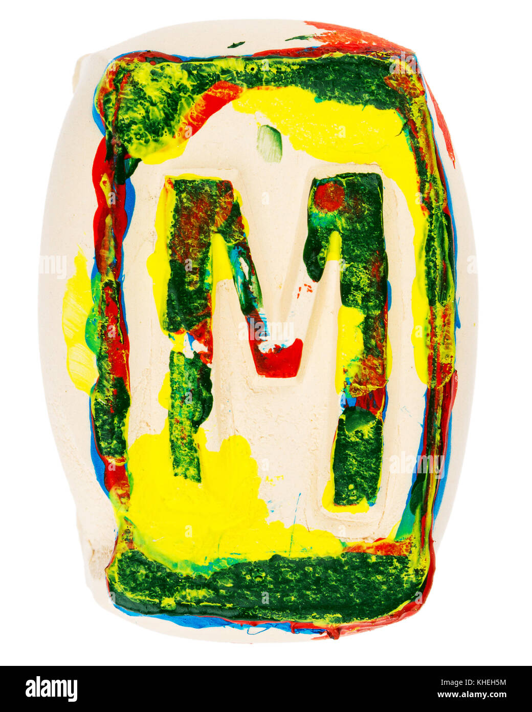 Handmade of white clay letter M painted with colorful acrylic paints ...