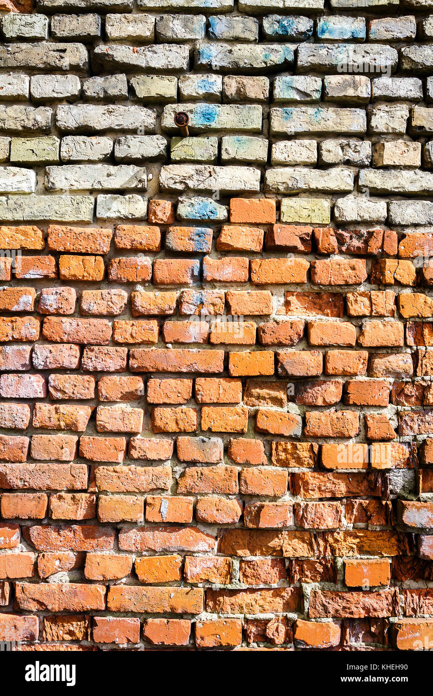 Background of red and yellow brick wall texture Stock Photo - Alamy