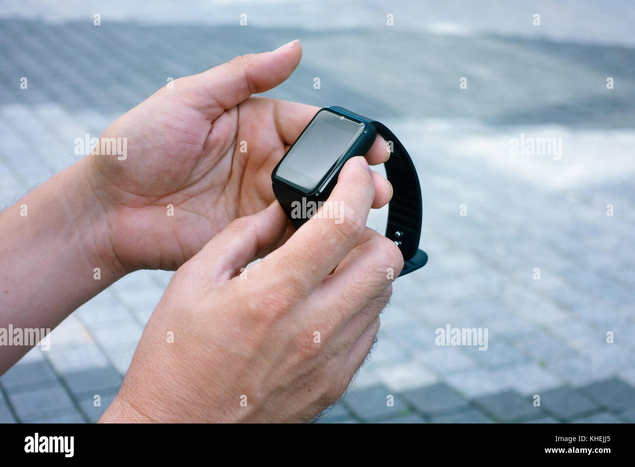 Man using smart watch Stock Photo - Alamy