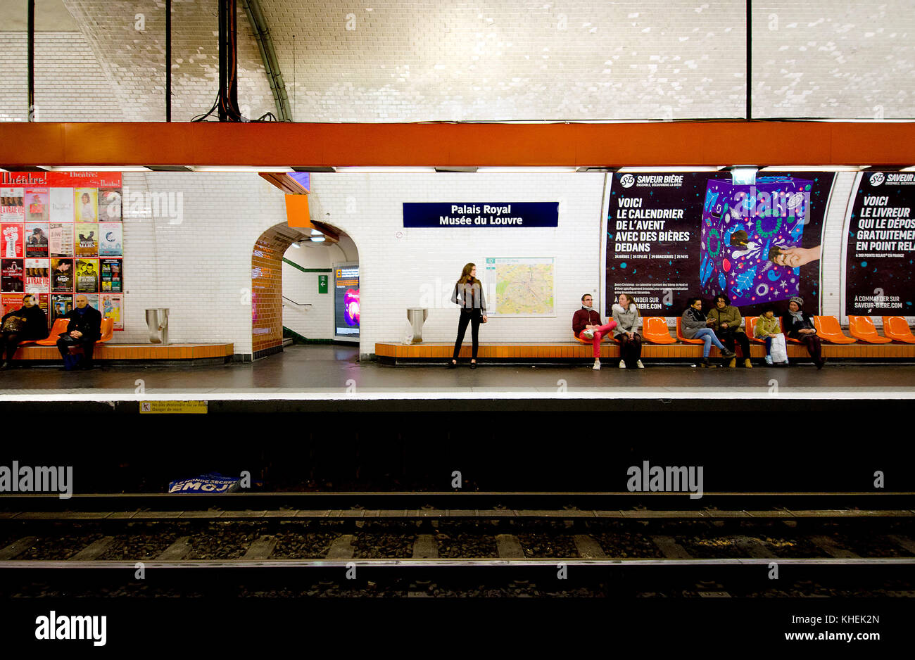 Paris, France. Paris Metro station - Palais Royal / Musee du Louvre. People on the platform ...