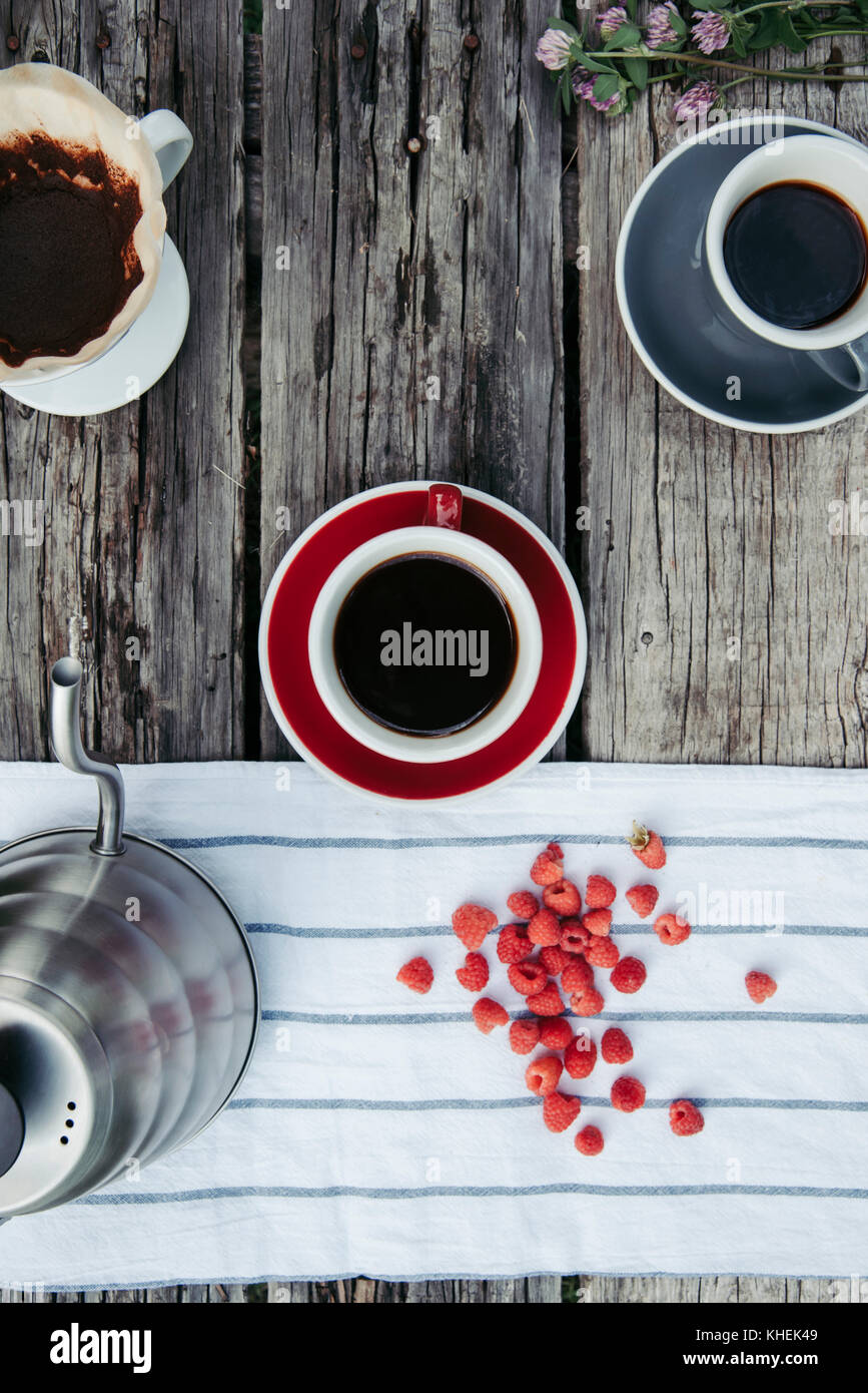 Delicious fresh morning coffee on the rustic wooden table background ...