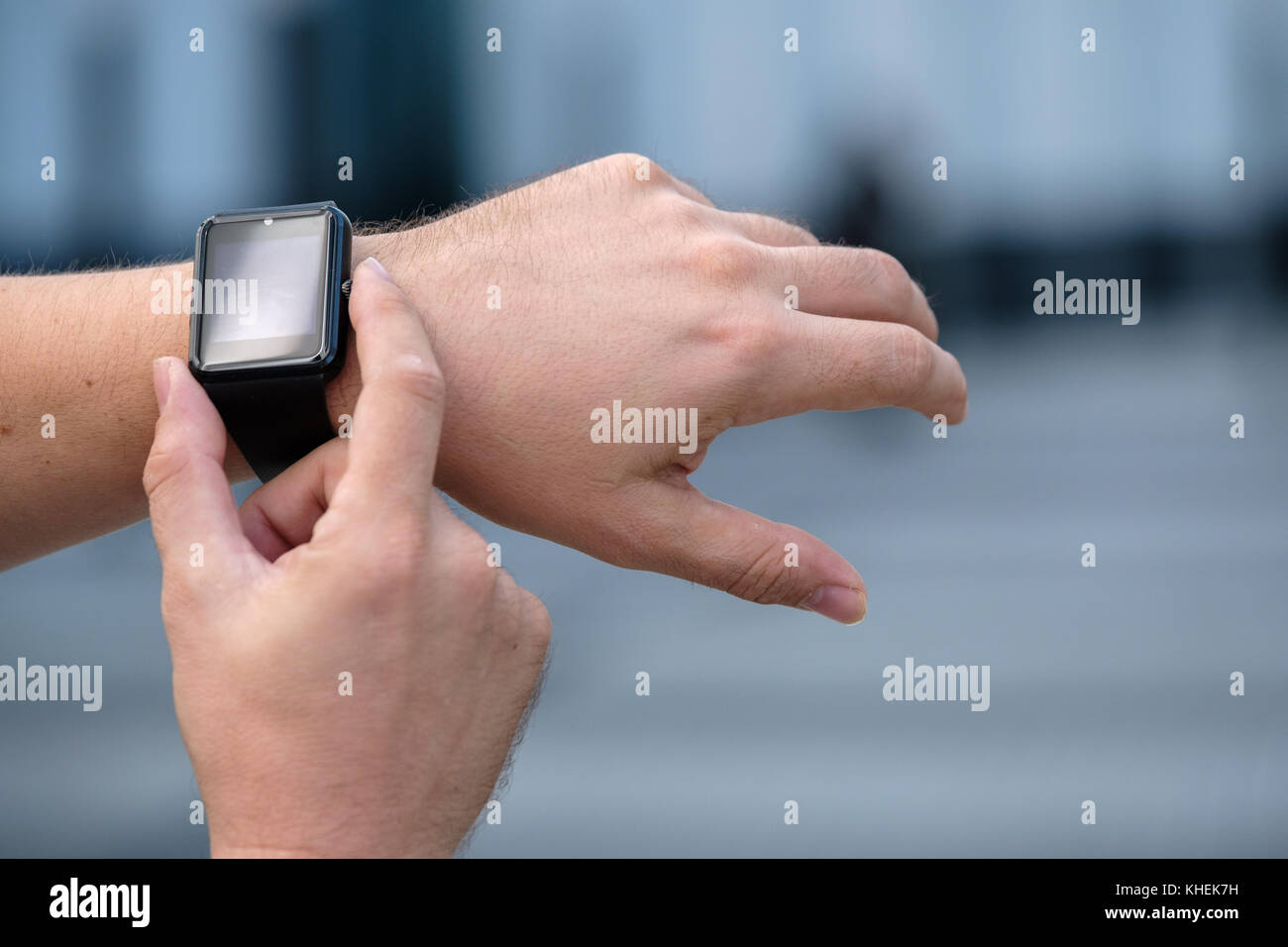 Man using smart watch Stock Photo - Alamy