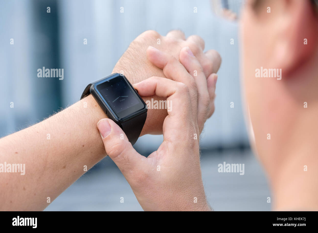 Man using smart watch Stock Photo - Alamy