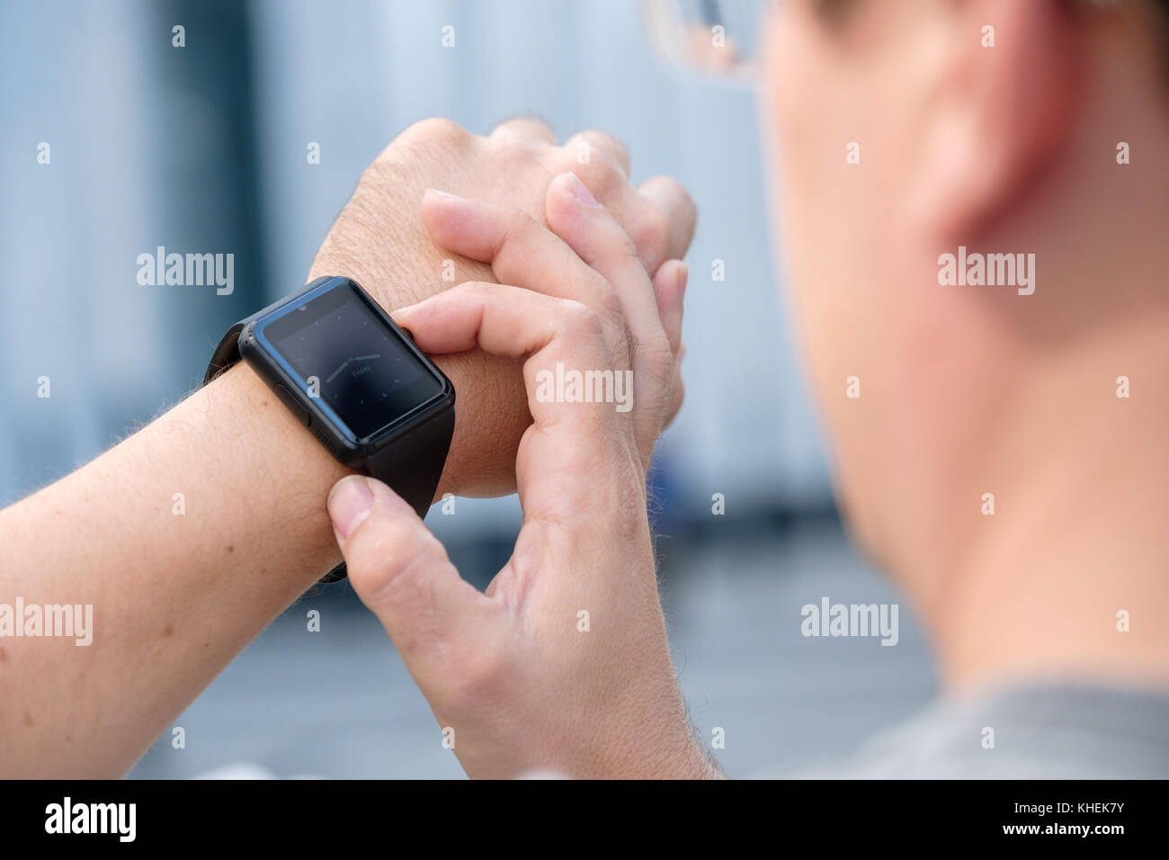 Man using smart watch Stock Photo - Alamy