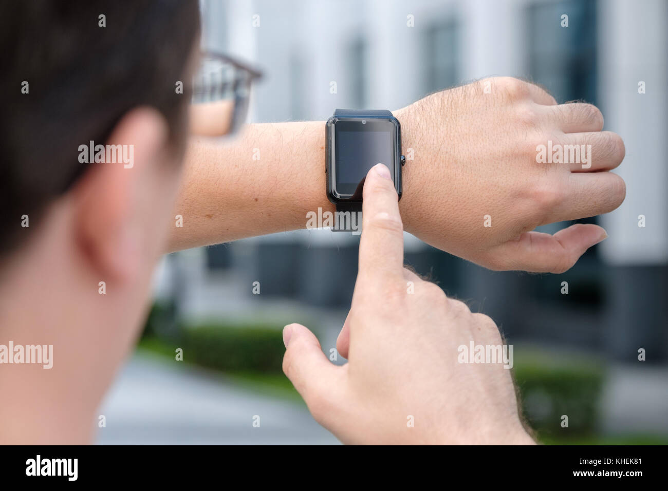 Man using smart watch Stock Photo - Alamy