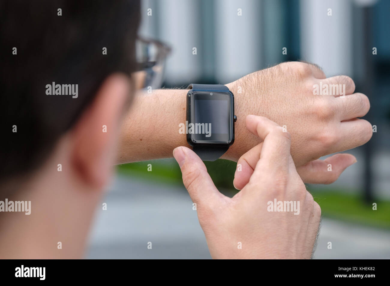 Man using smart watch Stock Photo - Alamy