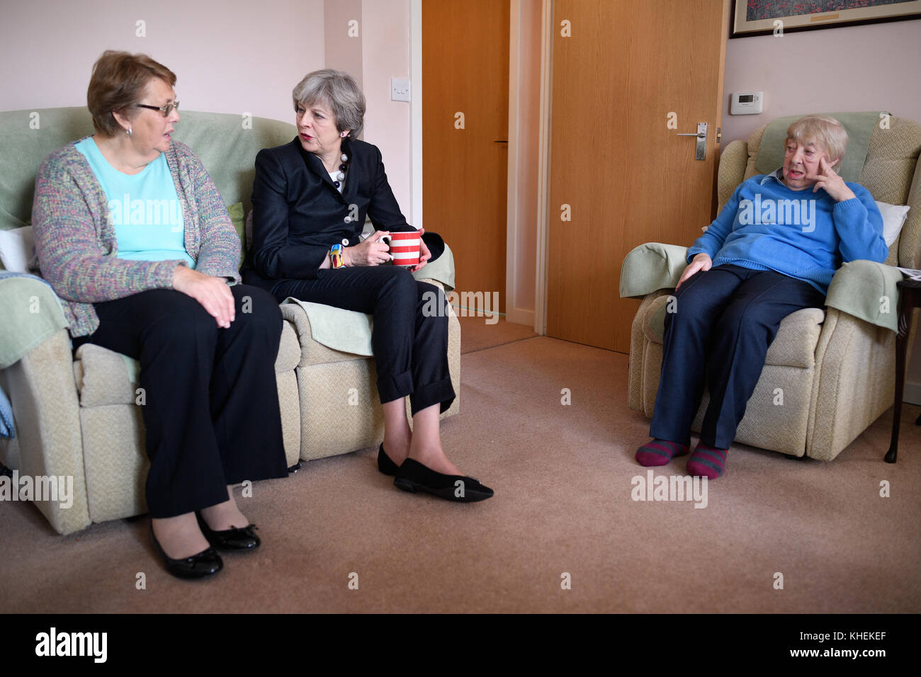 Prime Minister Theresa May meets residents Val Lay (left) and Rita ...
