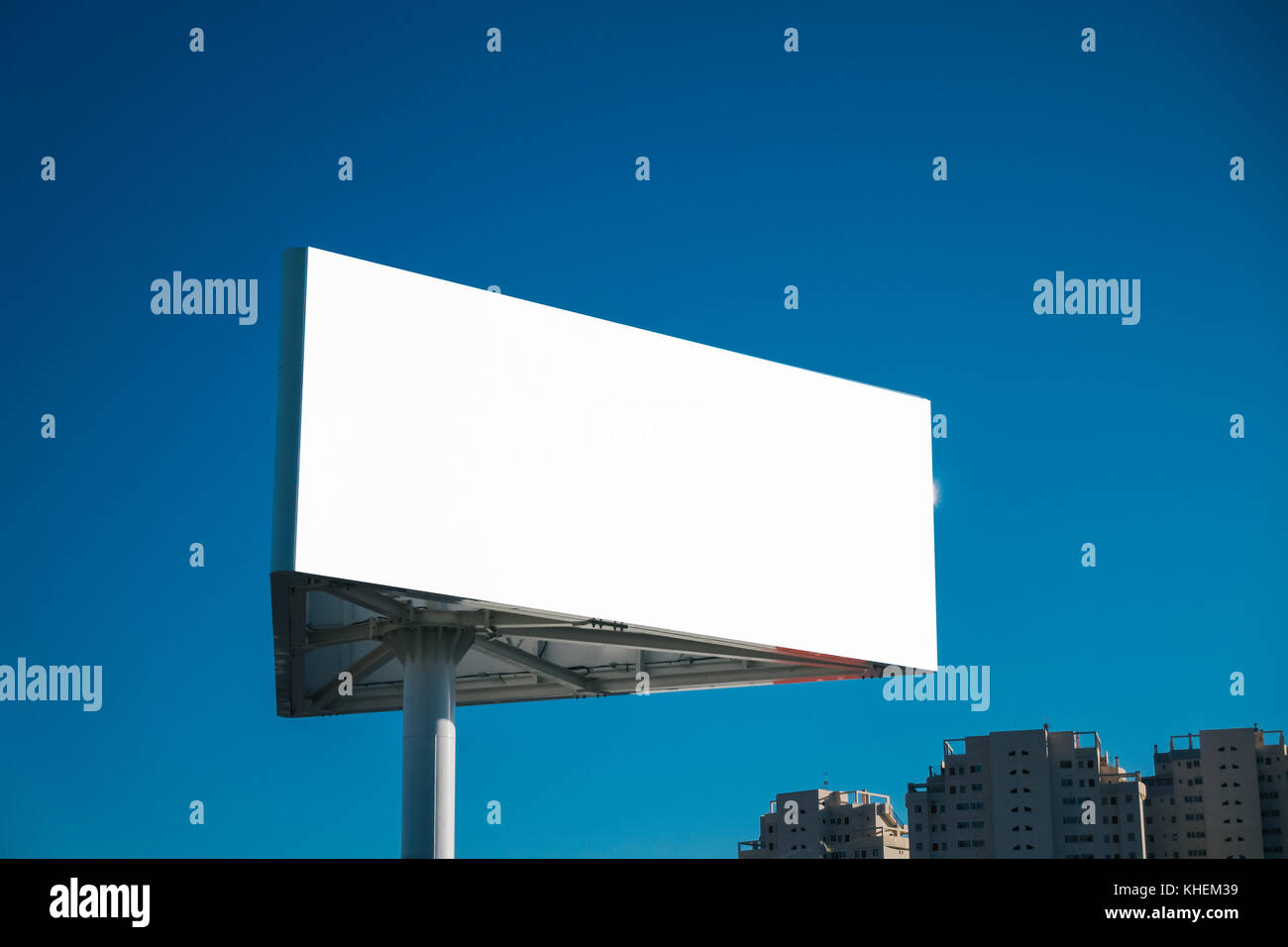 Mock up. Triangle billboard or advertising poster with blue sky ...