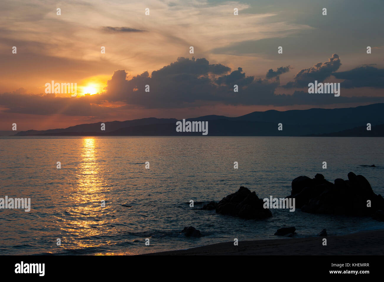 Sunset on the beach of Capu Laurosu, Corsica, France Stock Photo - Alamy