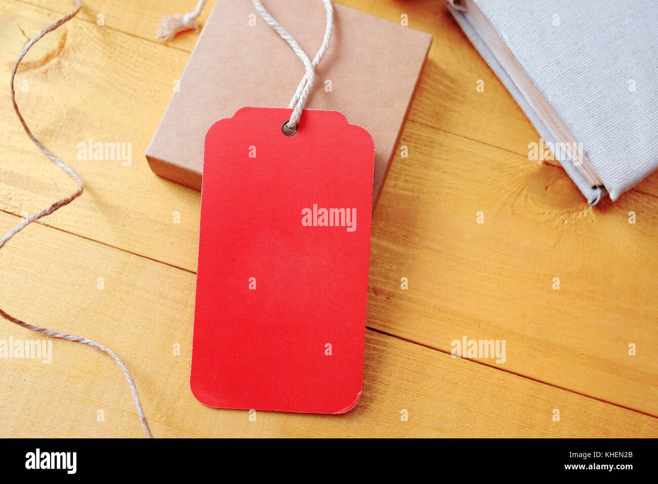 Large Price red Tag red tag on a golden wooden background Stock Photo ...