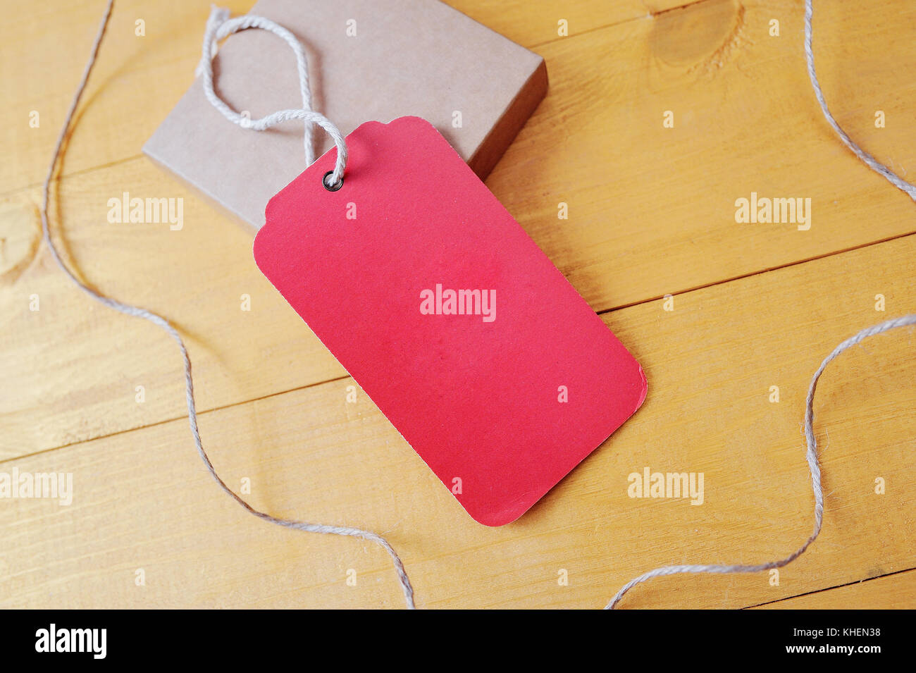 Large Price red Tag red tag on a golden wooden background Stock Photo ...