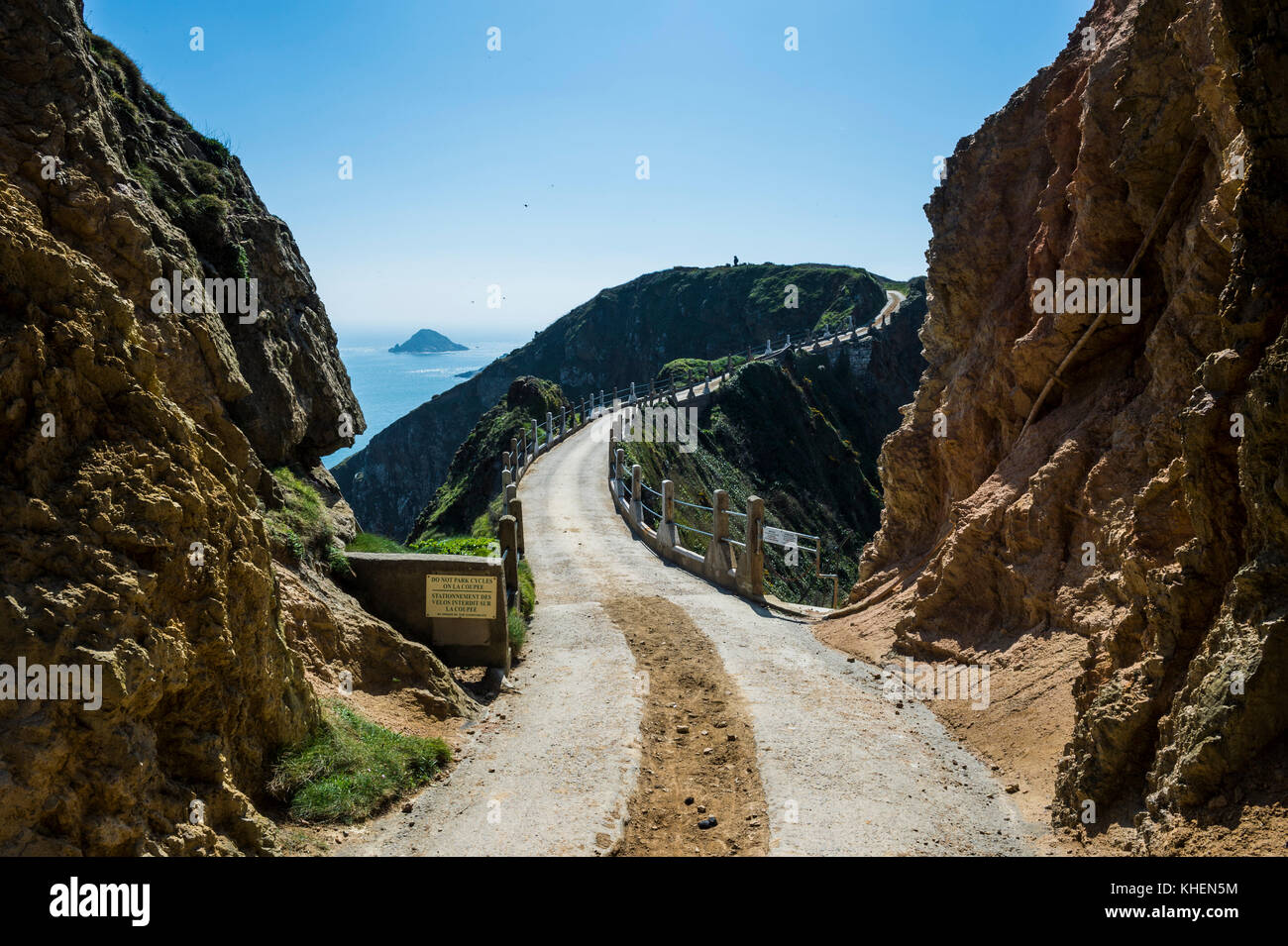 Road connecting the narrow isthmus of Greater and Little Sark, Channel ...