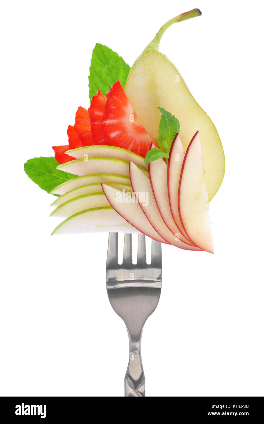 Fresh colorful fruits on fork, isolated on white Stock Photo - Alamy