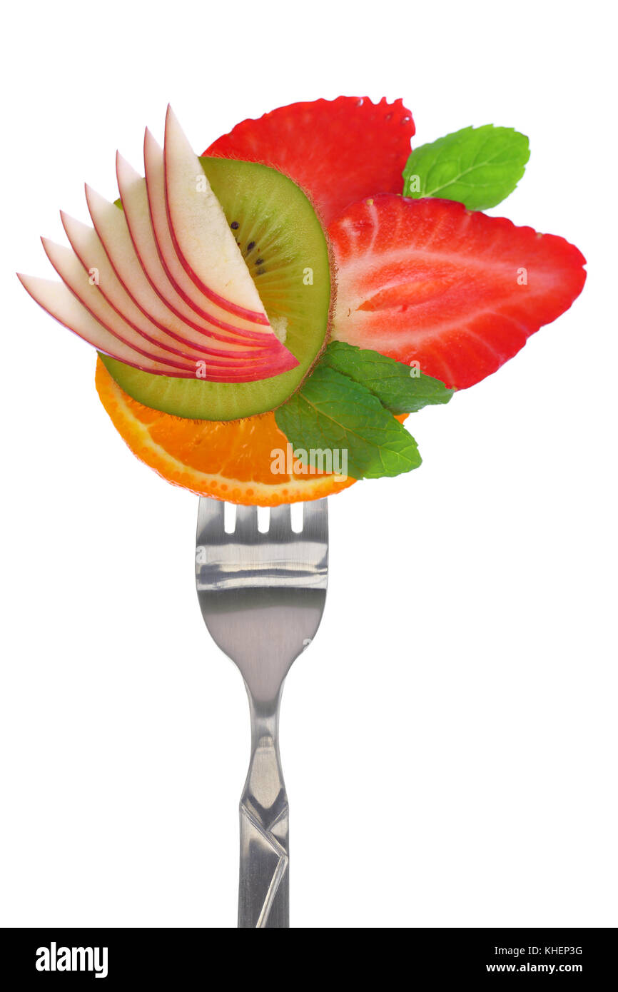 Fresh colorful fruits on fork, isolated on white Stock Photo - Alamy