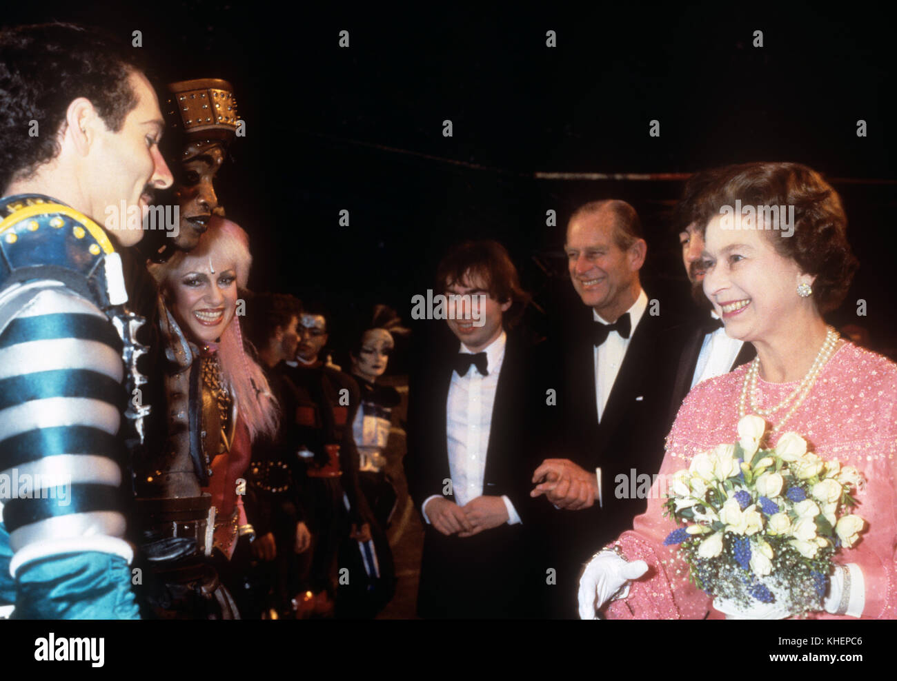 Queen Elizabeth II, with Prince Philip and Andrew Lloyd Webber, meets ...