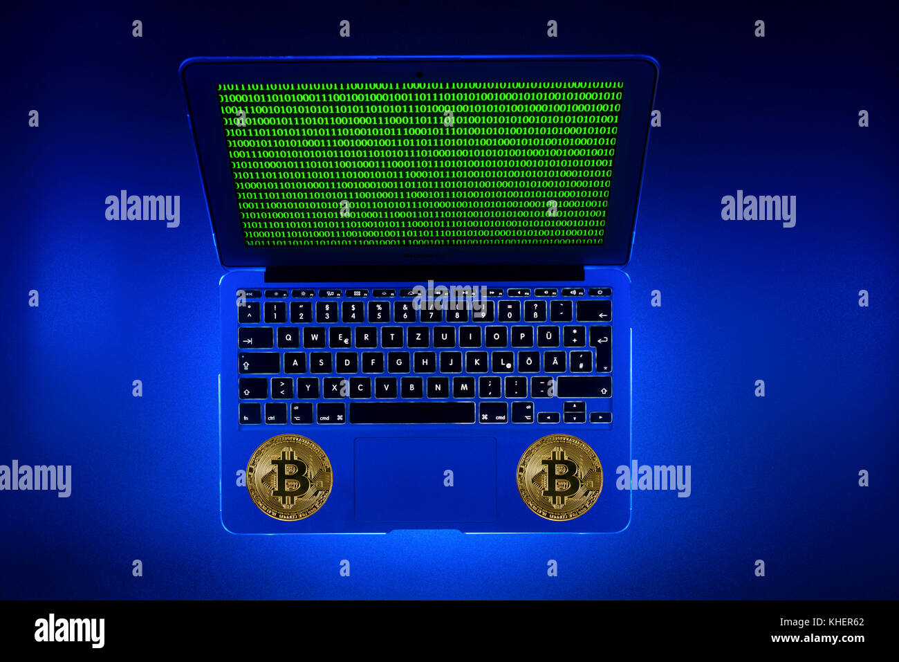 Symbol image digital currency, gold physical coin bitcoin laptop with digital binary code Stock ...