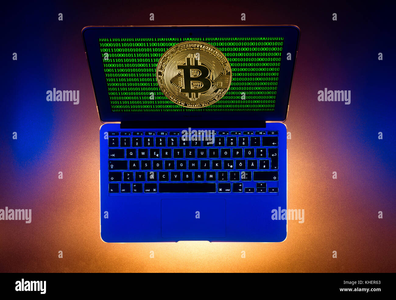 Symbol image digital currency, gold physical coin bitcoin laptop with digital binary code Stock ...