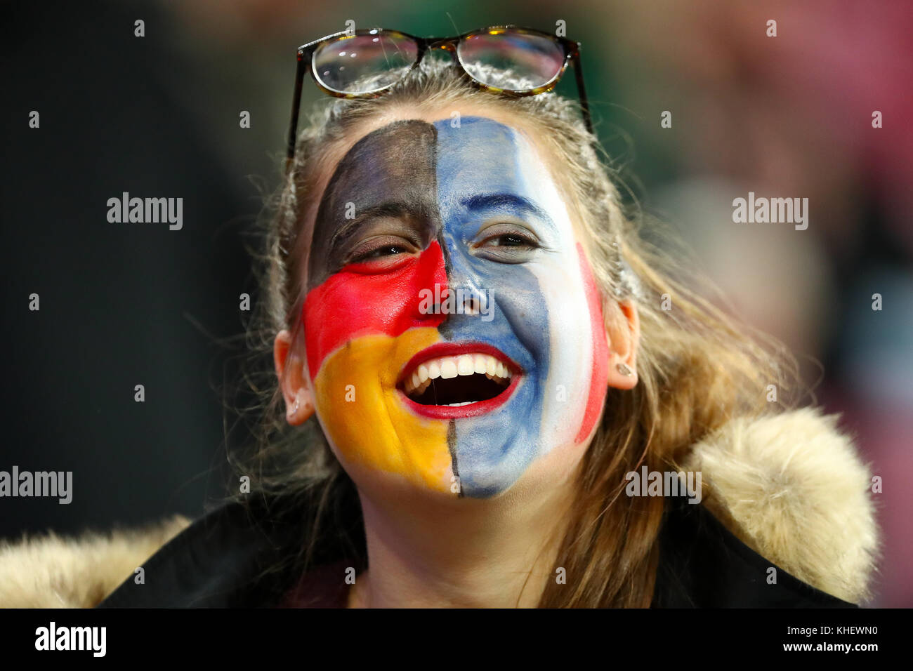 Cologne, Germany. 14th Nov, 2017. A young French woman has make up on ...