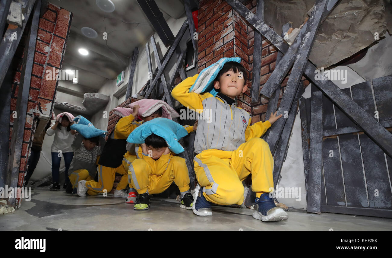 17th Nov, 2017. Quake evacuation training Children participate in a ...